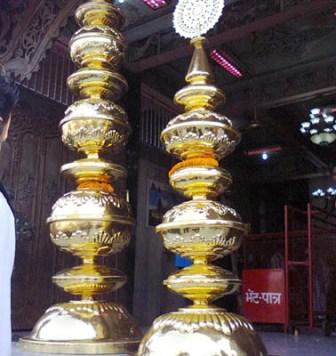 Golden Kalash installed on the spire of Mahavir Mandir,